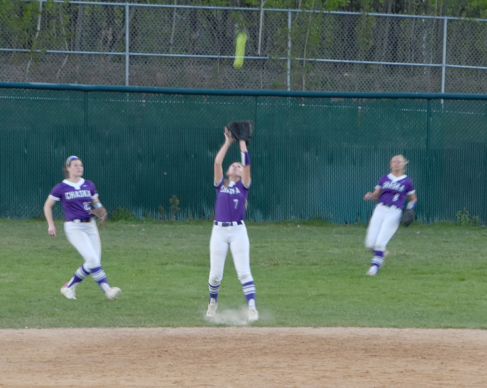 Kaedyn DeBruine (C) making the put out at Chan. Backed up by Elizabeth ...